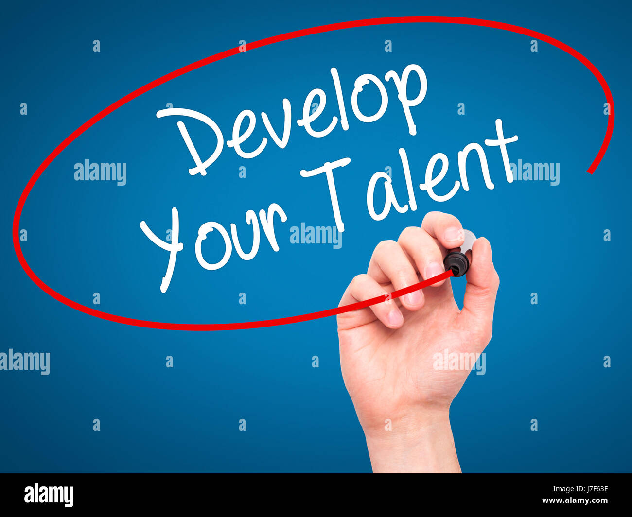 Man Hand writing Develop Your Talent with black marker on visual screen ...