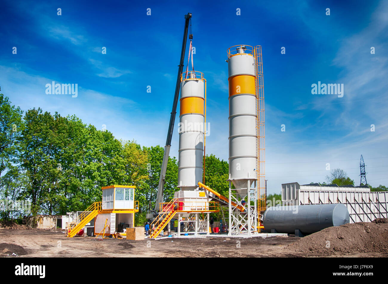 Concrete mixing silo, site construction facilities Stock Photo - Alamy