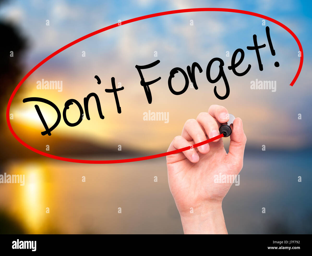 Man Hand writing Don't Forget! with black marker on visual screen ...