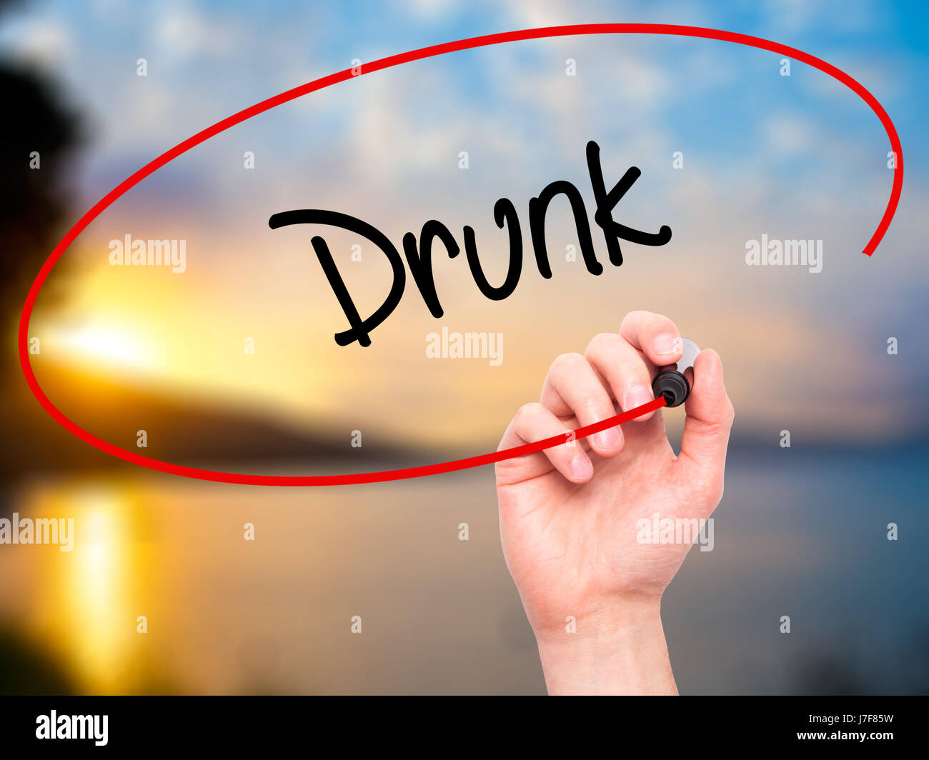 Man Hand writing Drunk with black marker on visual screen. Isolated on ...