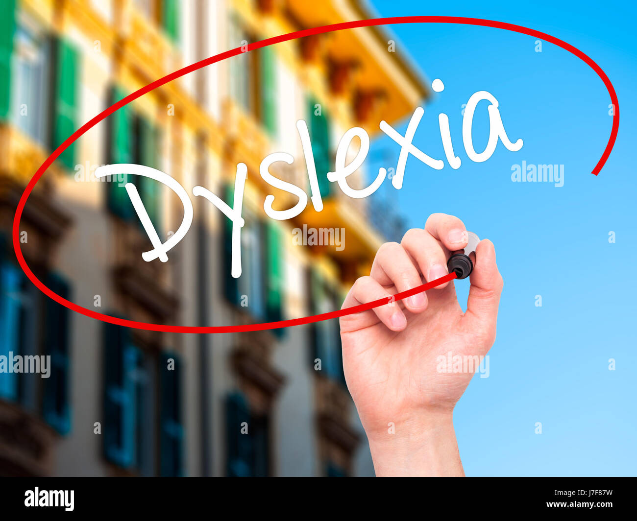 Man Hand writing Dyslexia with black marker on visual screen. Isolated ...