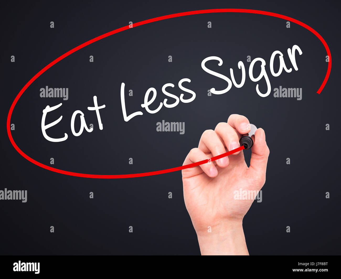 Man Hand writing Eat Less Sugar with black marker on visual screen ...