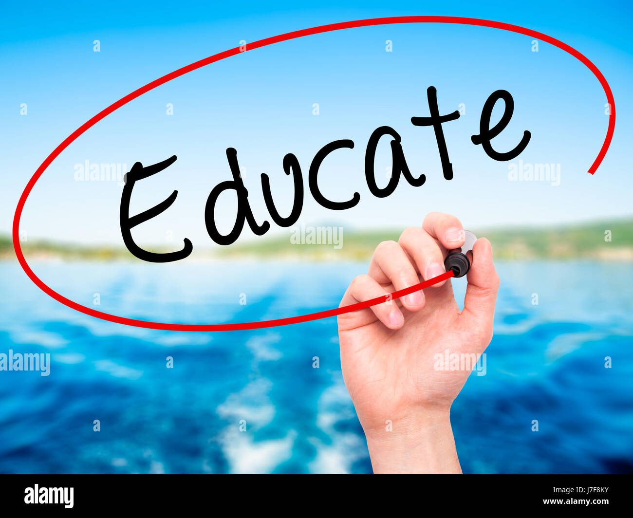 Man Hand writing Educate with black marker on visual screen. Isolated ...