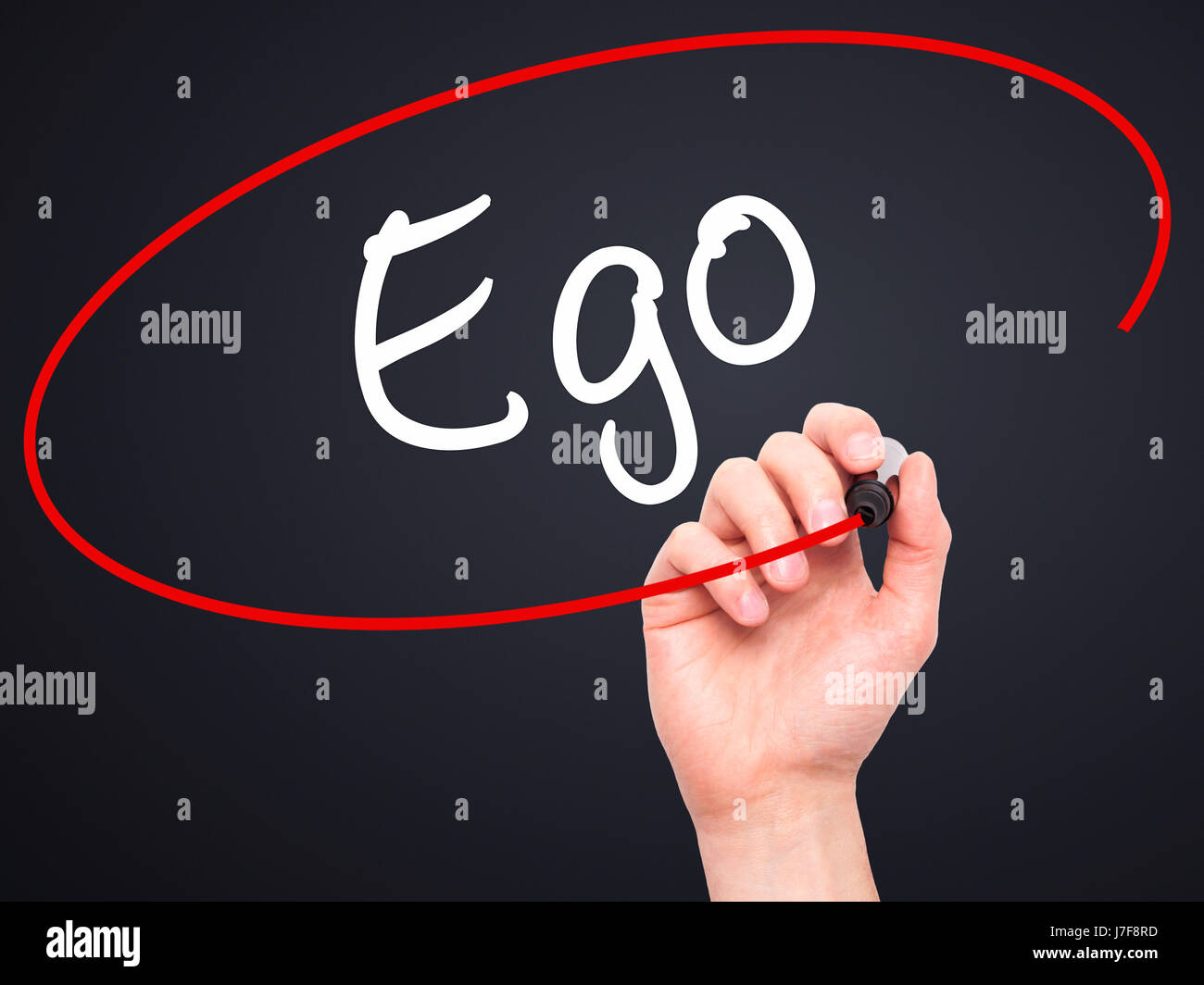 Man Hand writing Ego with black marker on visual screen. Isolated on ...