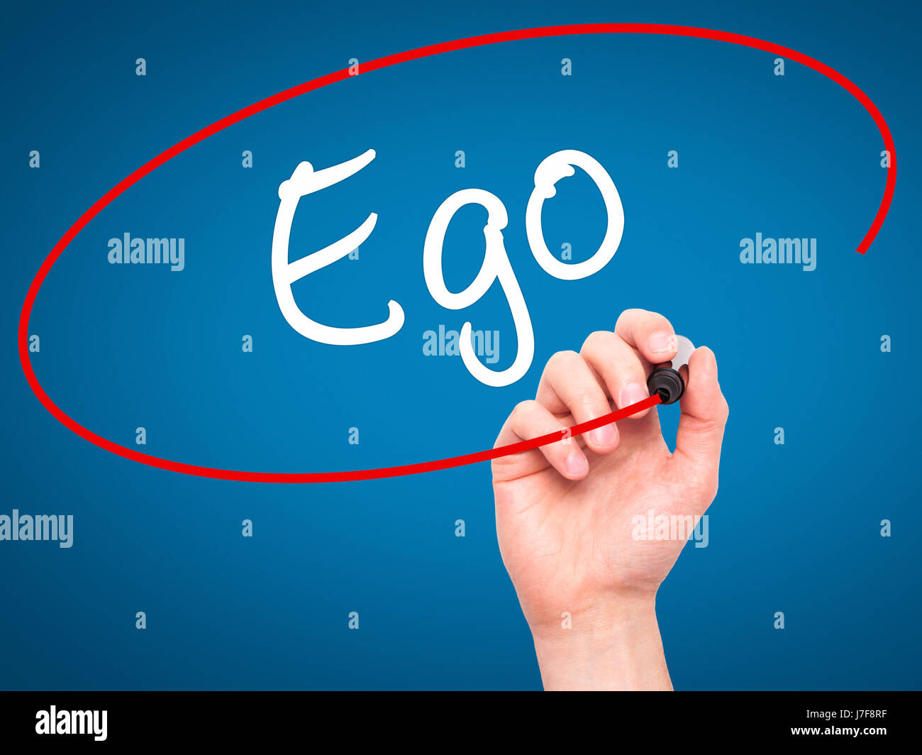 Man Hand writing Ego with black marker on visual screen. Isolated on ...