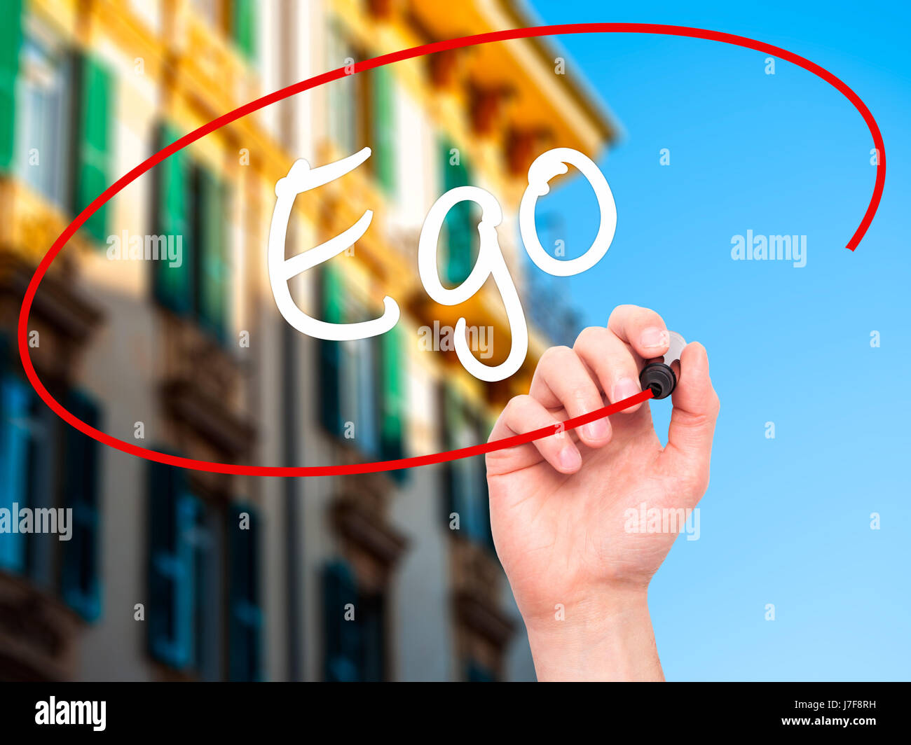 Man Hand writing Ego with black marker on visual screen. Isolated on ...