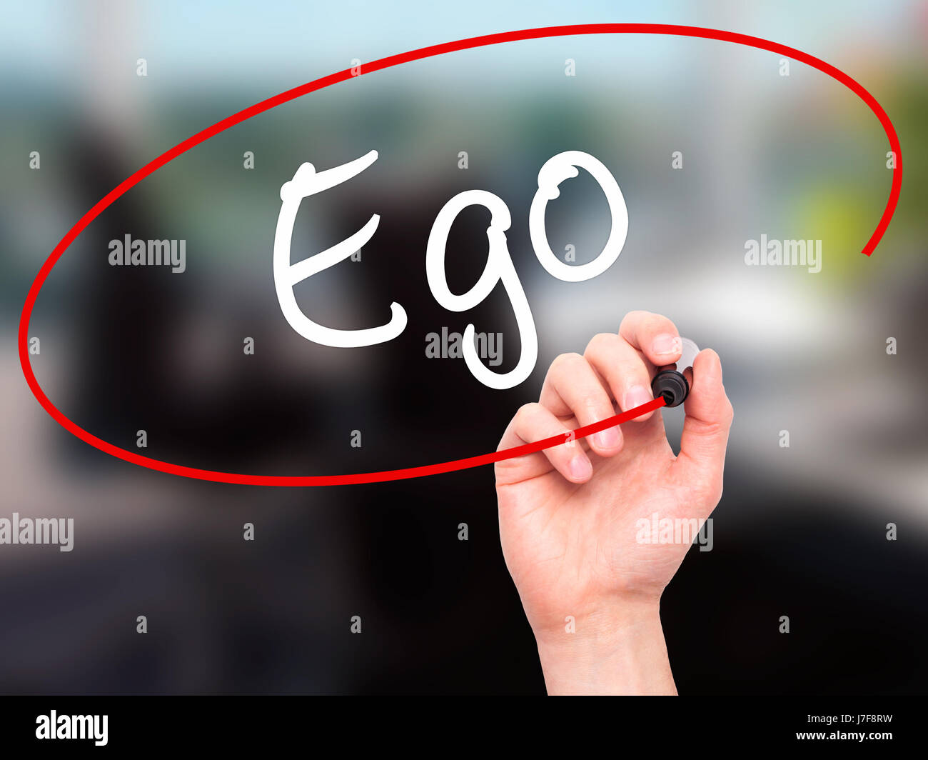 Man Hand writing Ego with black marker on visual screen. Isolated on ...