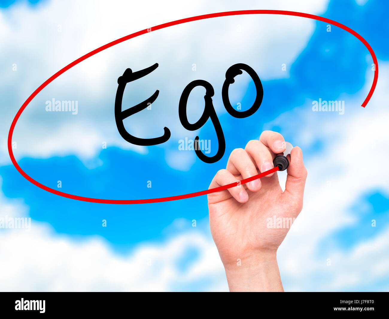 Man Hand writing Ego with black marker on visual screen. Isolated on ...
