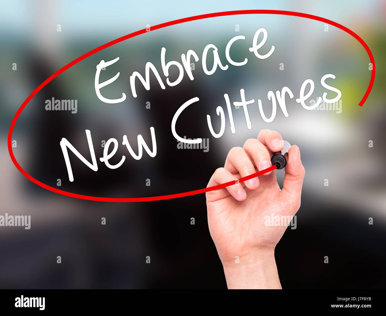 Man Hand writing Embrace New Cultures with black marker on visual ...