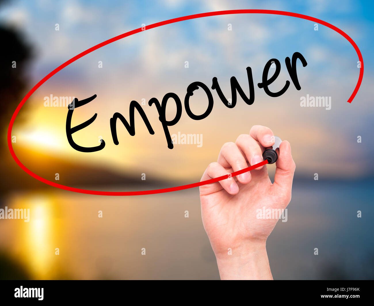 Man Hand writing Empower with black marker on visual screen. Isolated ...