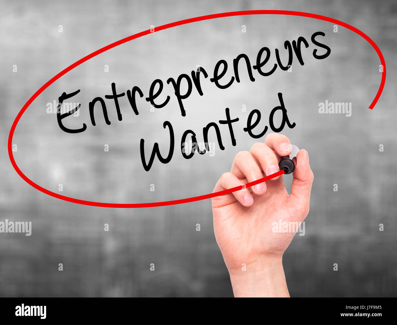 Man Hand writing Entrepreneurs Wanted with black marker on visual ...