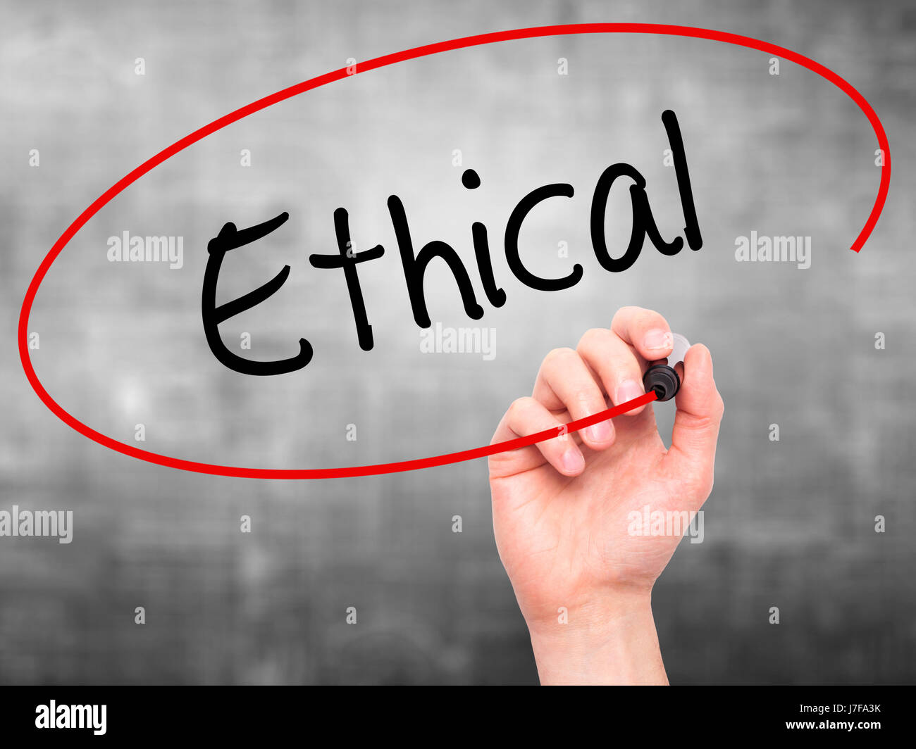 Man Hand writing Ethical with black marker on visual screen. Isolated ...