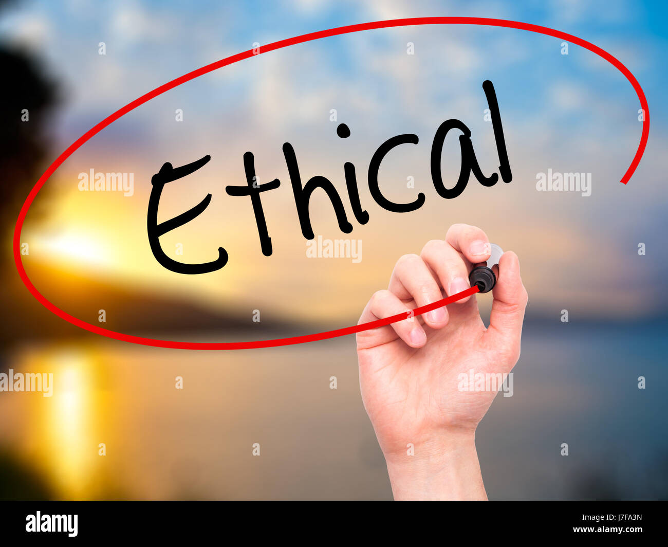 Man Hand writing Ethical with black marker on visual screen. Isolated ...