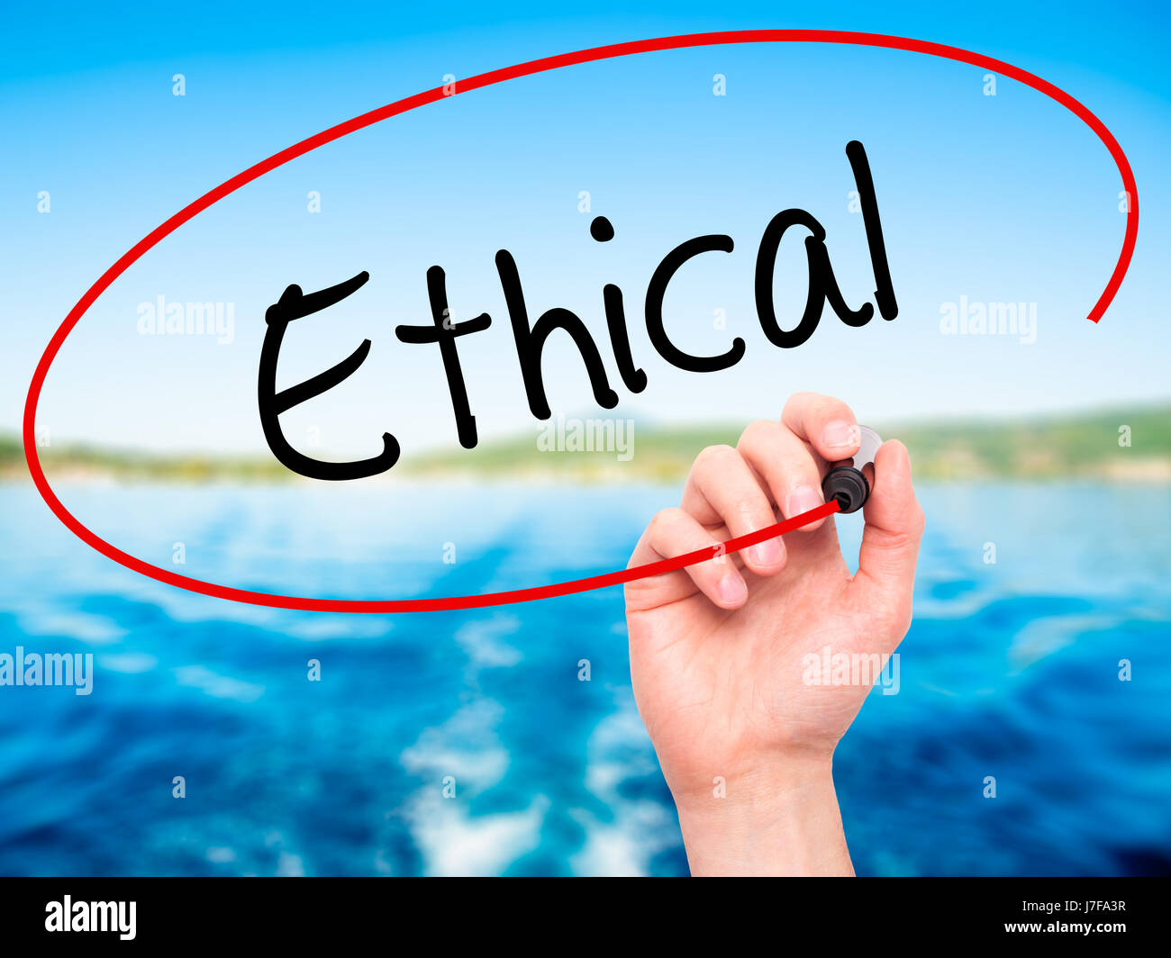 Man Hand writing Ethical with black marker on visual screen. Isolated ...