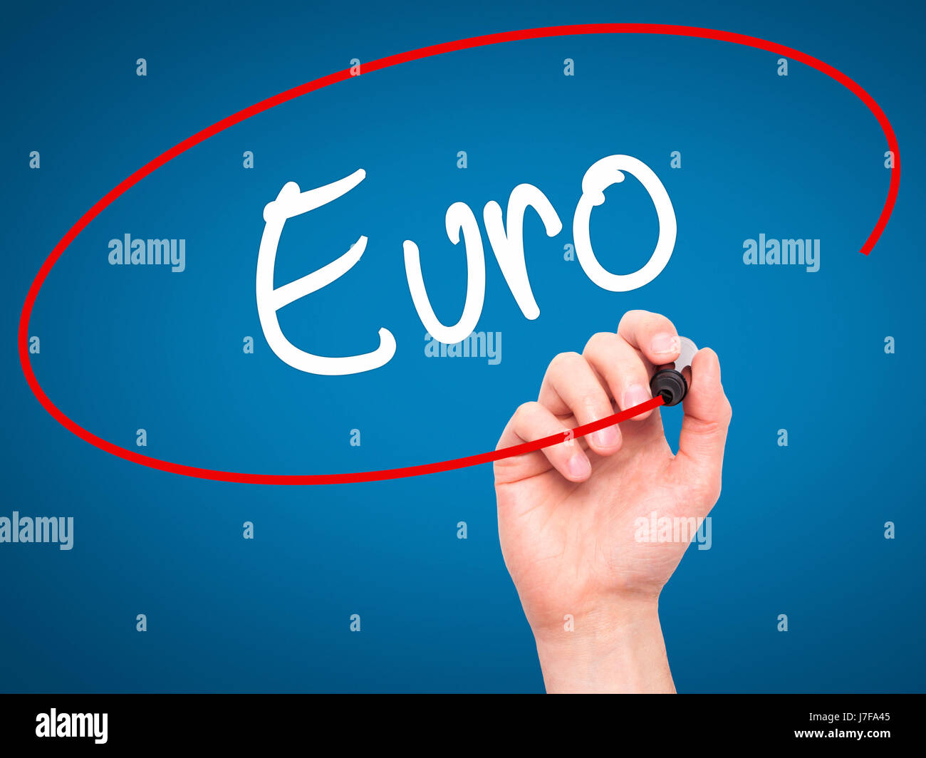 Man Hand writing Euro with black marker on visual screen. Isolated on ...