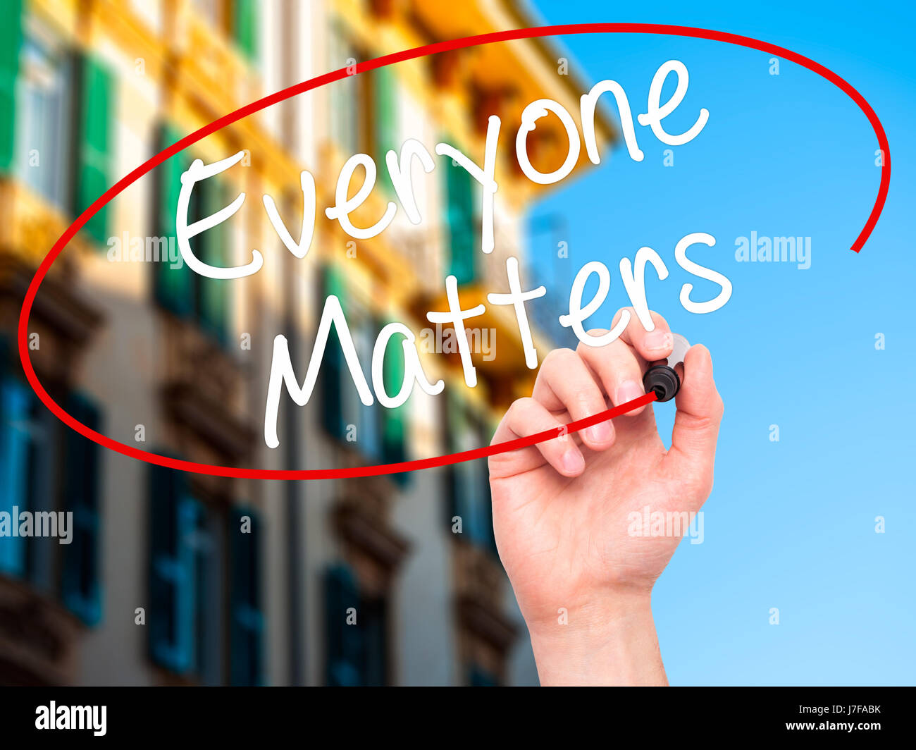 Man Hand writing Everyone Matters with black marker on visual screen ...