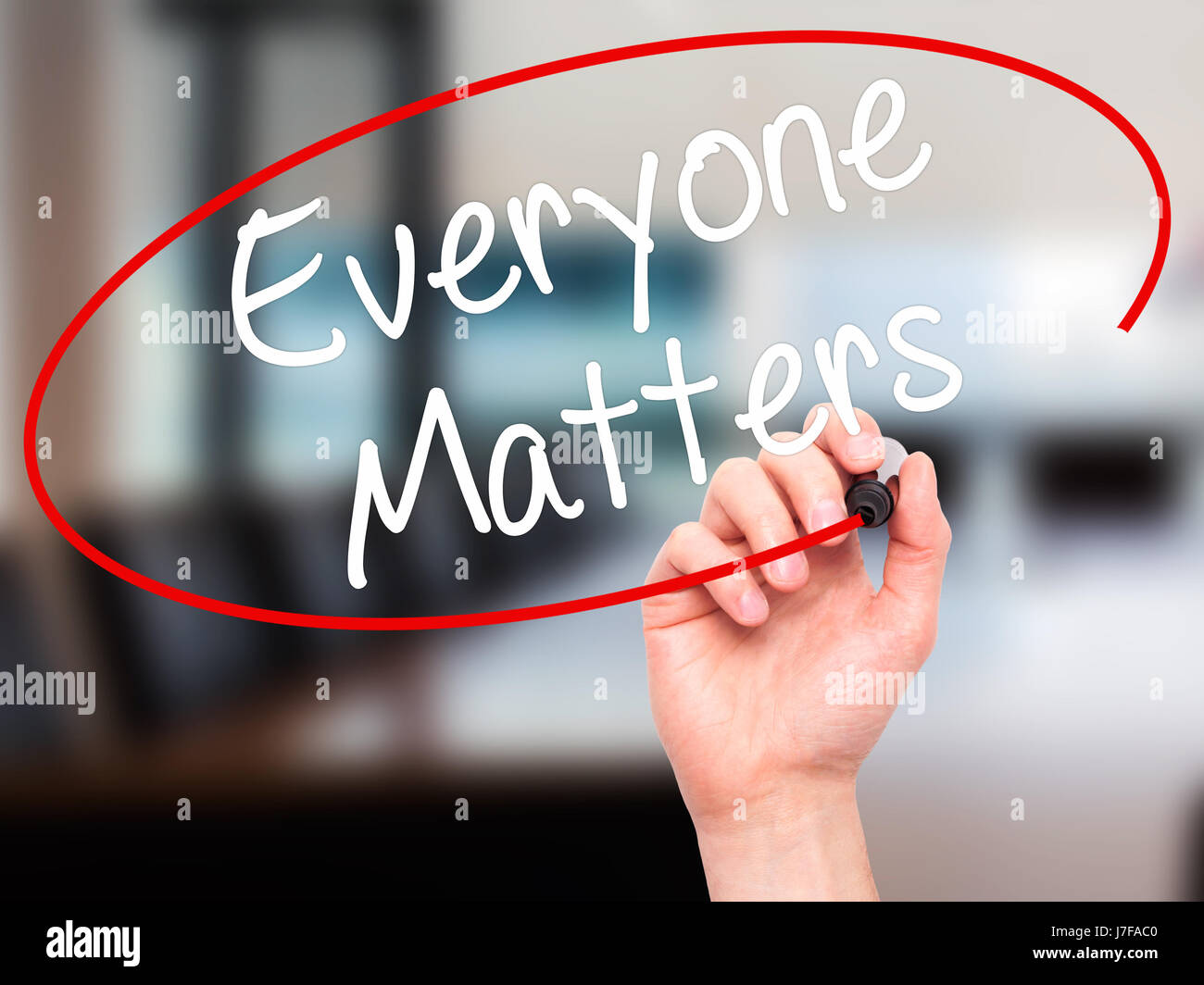 Man Hand writing Everyone Matters with black marker on visual screen ...