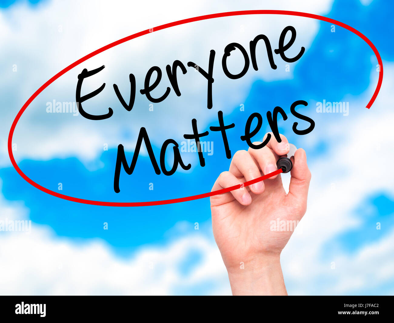 Man Hand writing Everyone Matters with black marker on visual screen ...