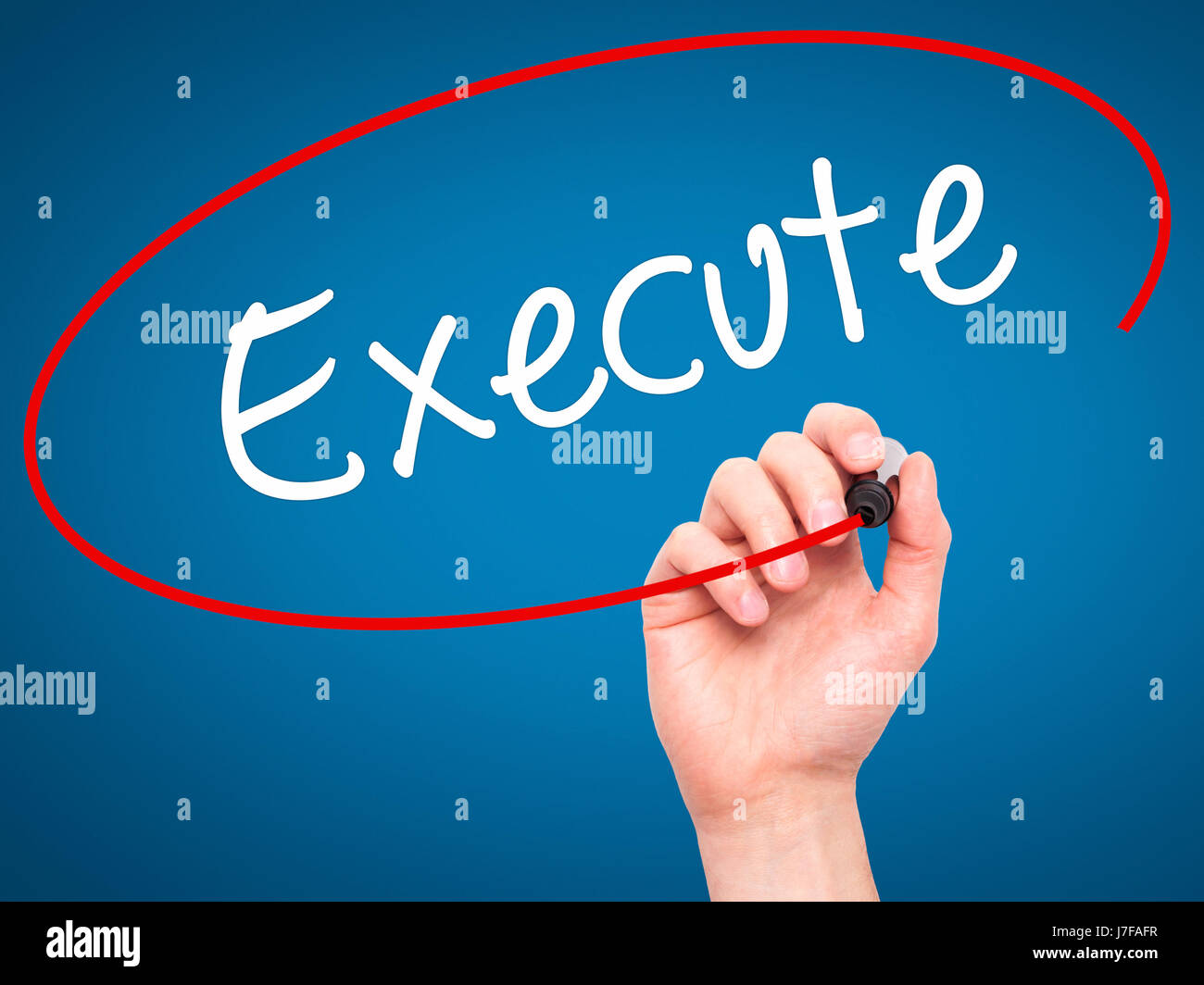 Man Hand writing Execute with black marker on visual screen. Isolated ...