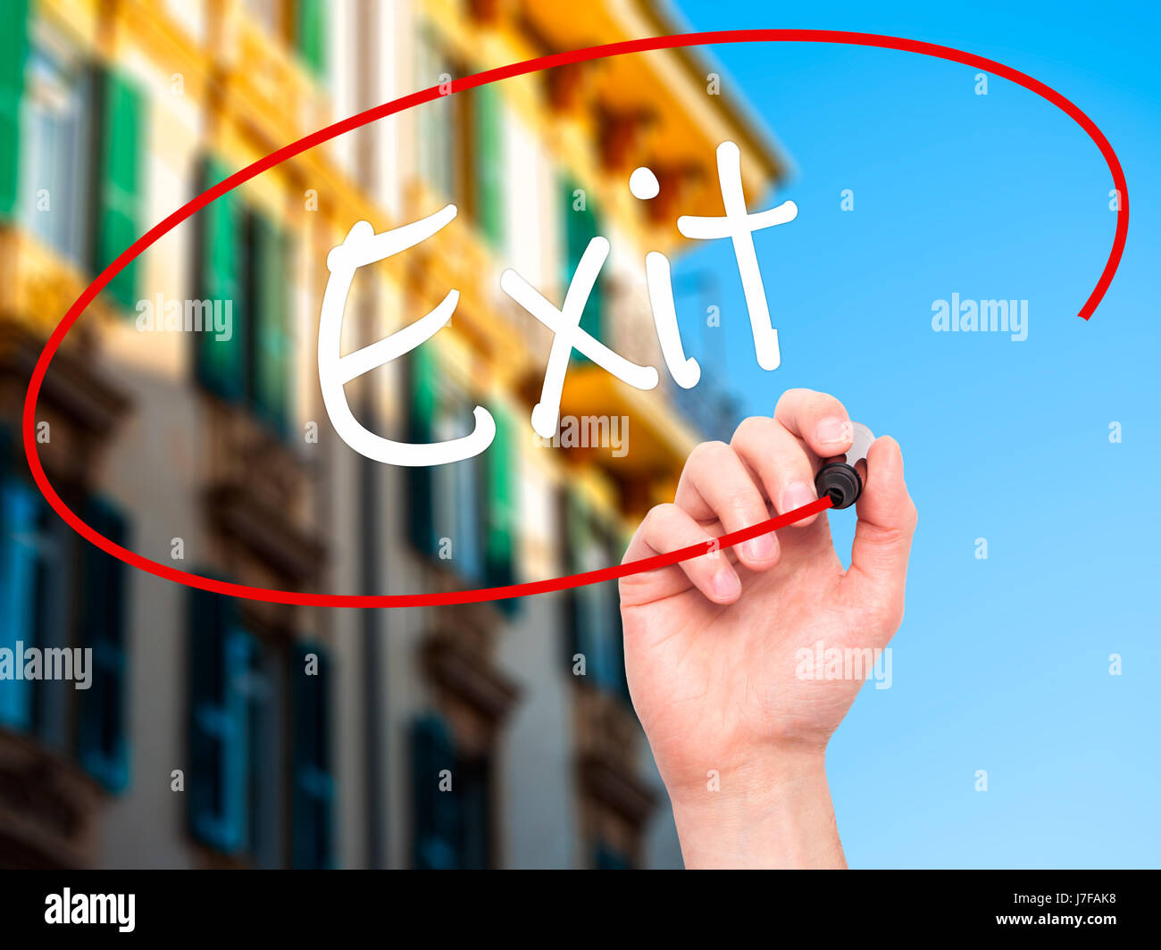 Man Hand writing Exit with black marker on visual screen. Isolated on ...