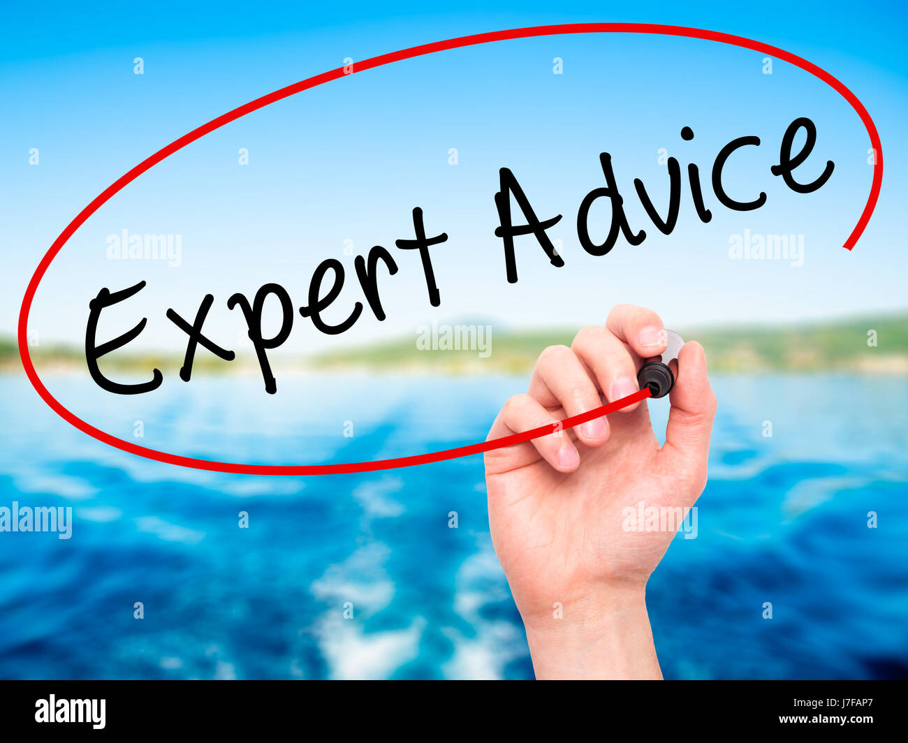 Man Hand writing Expert Advice with black marker on visual screen ...