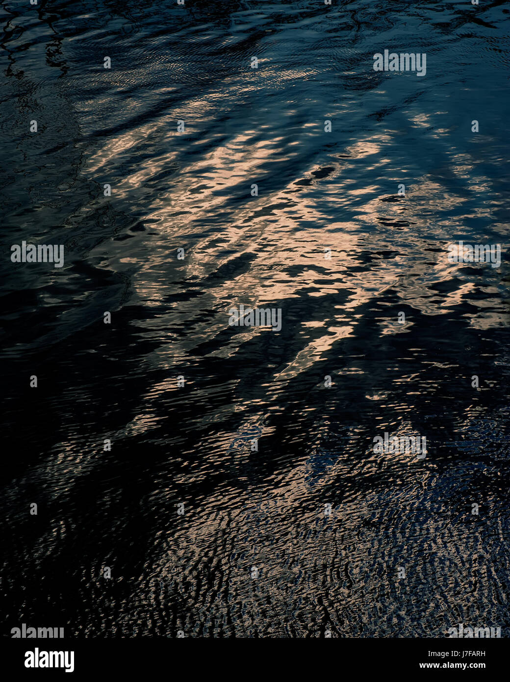 reflection of the sun on the surface of the water in the river Stock ...