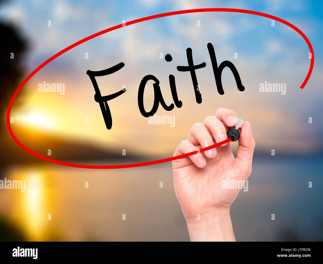 Man Hand writing Faith with black marker on visual screen. Isolated on ...