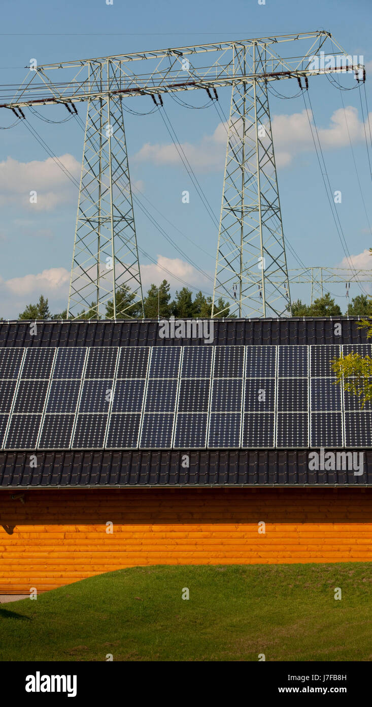 solar plant with electricity pylon Stock Photo - Alamy