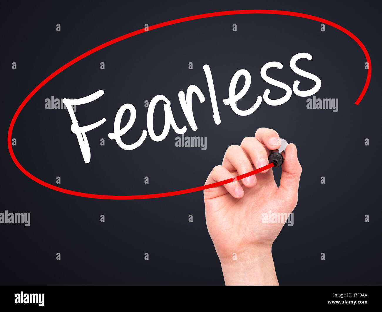 Man Hand writing Fearless with black marker on visual screen. Isolated ...