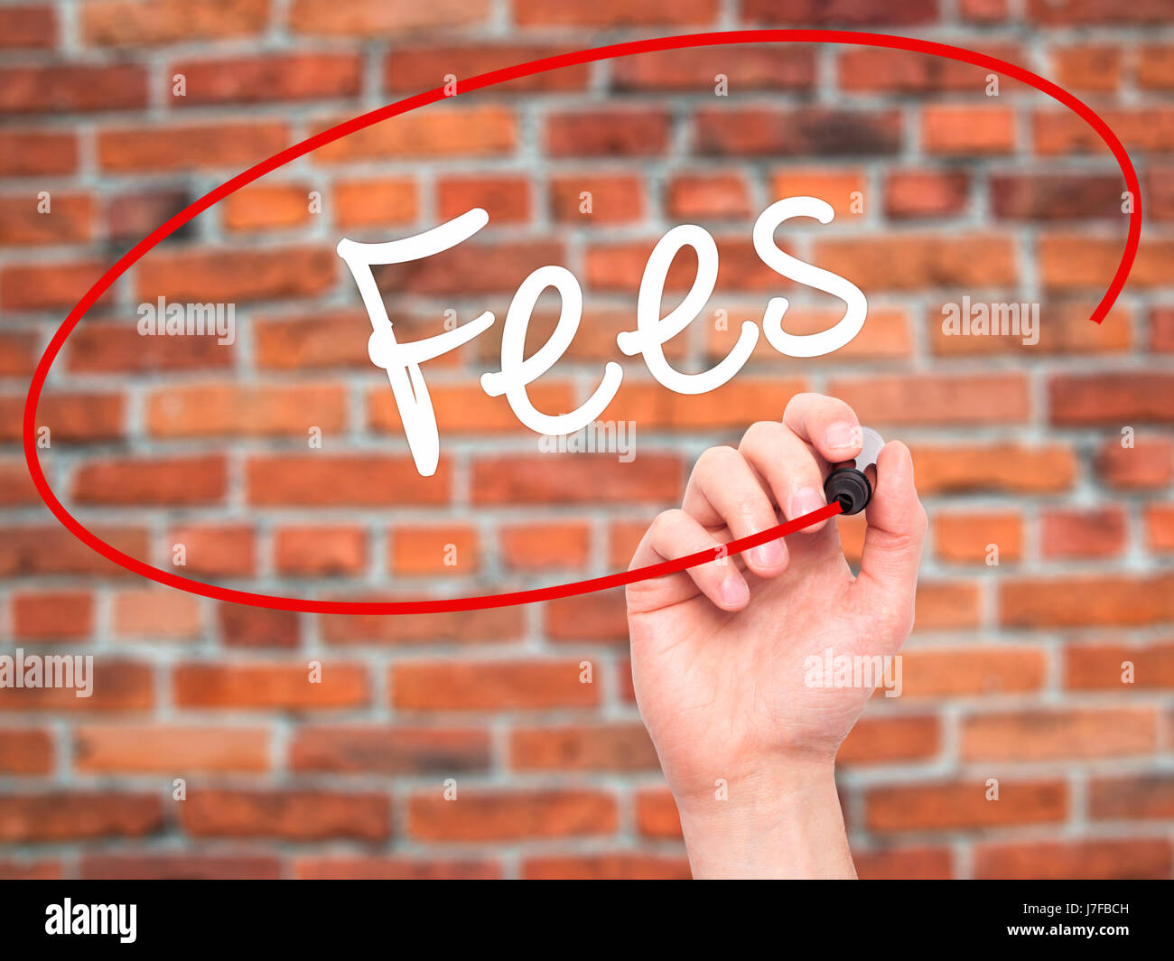 Man Hand writing Fees with black marker on visual screen. Isolated on ...