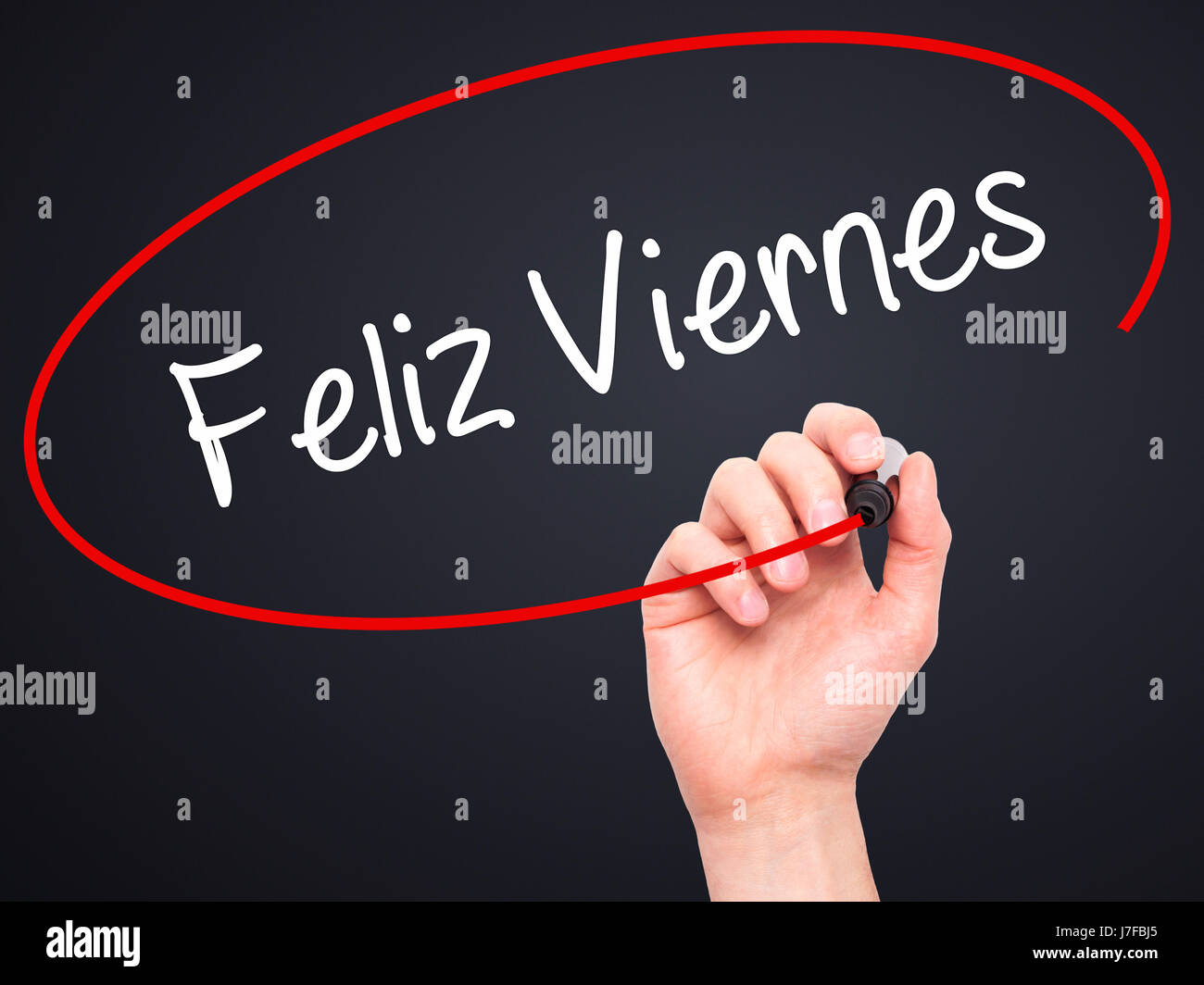 Man Hand writing Feliz Viernes (Happy Friday In Spanish) with black ...