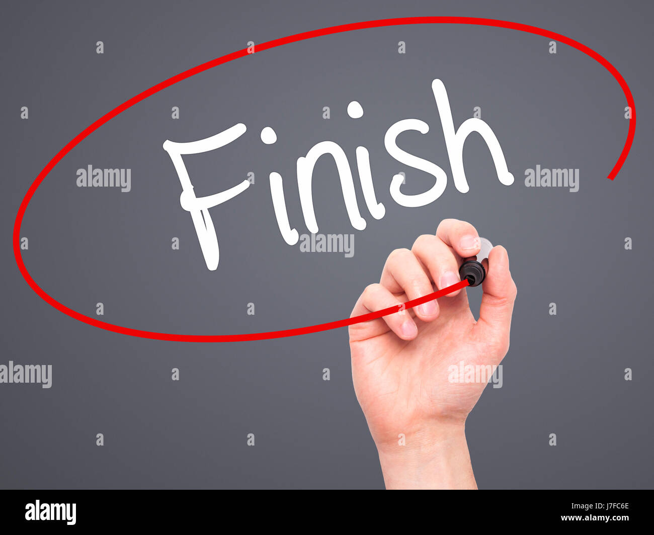 Man Hand writing Finish with black marker on visual screen. Isolated on ...