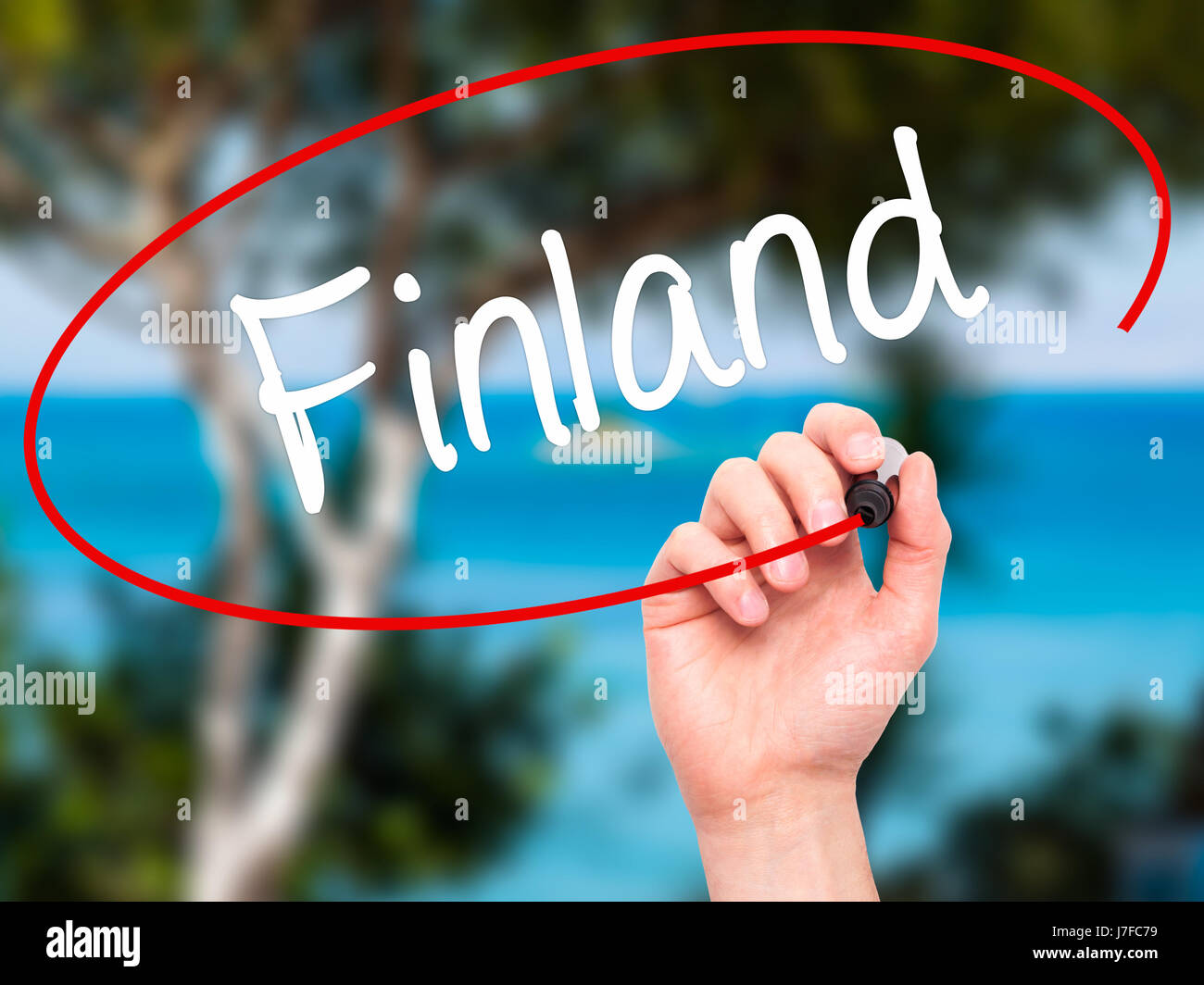 Man Hand writing Finland with black marker on visual screen. Isolated ...