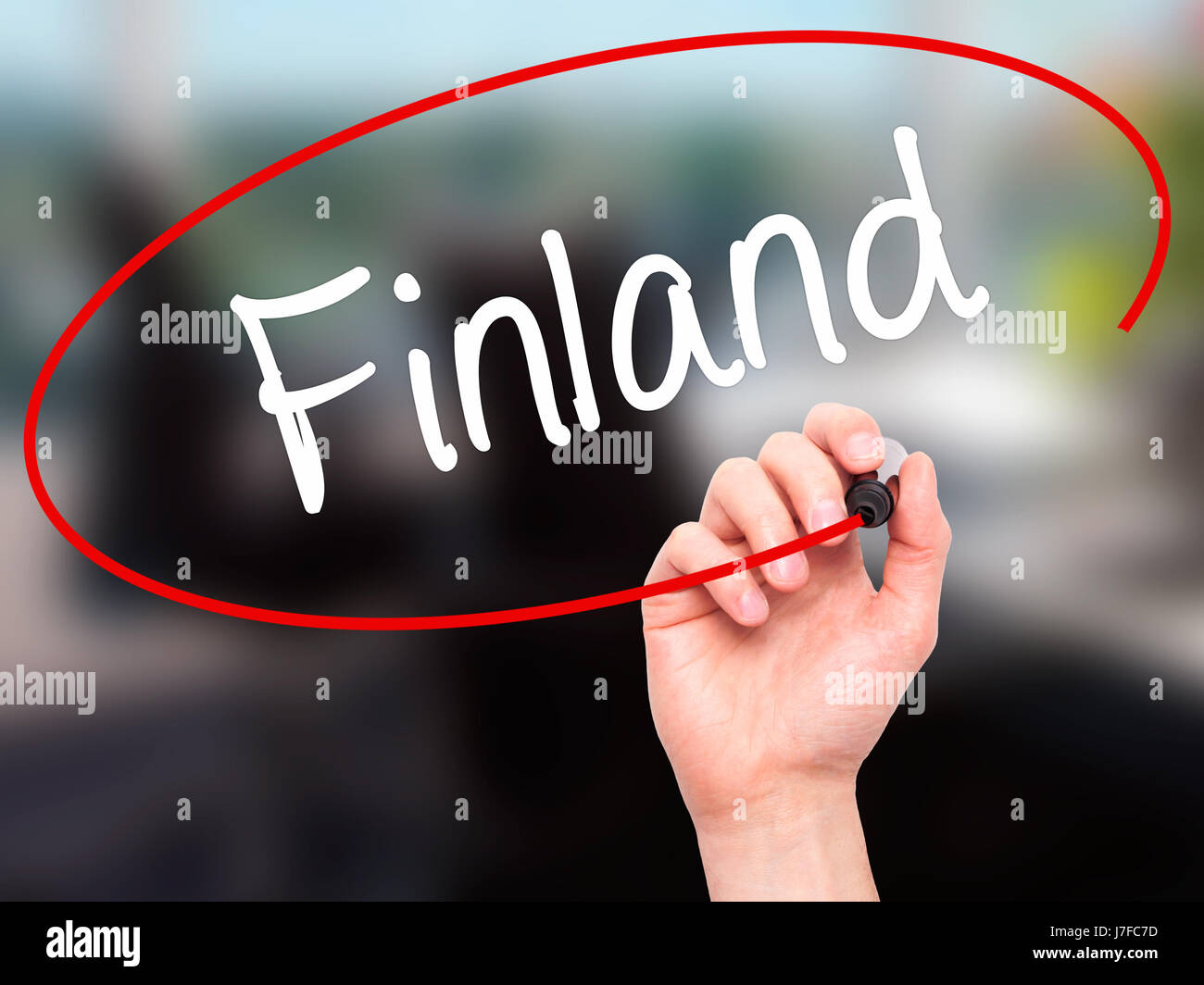 Man Hand writing Finland with black marker on visual screen. Isolated ...