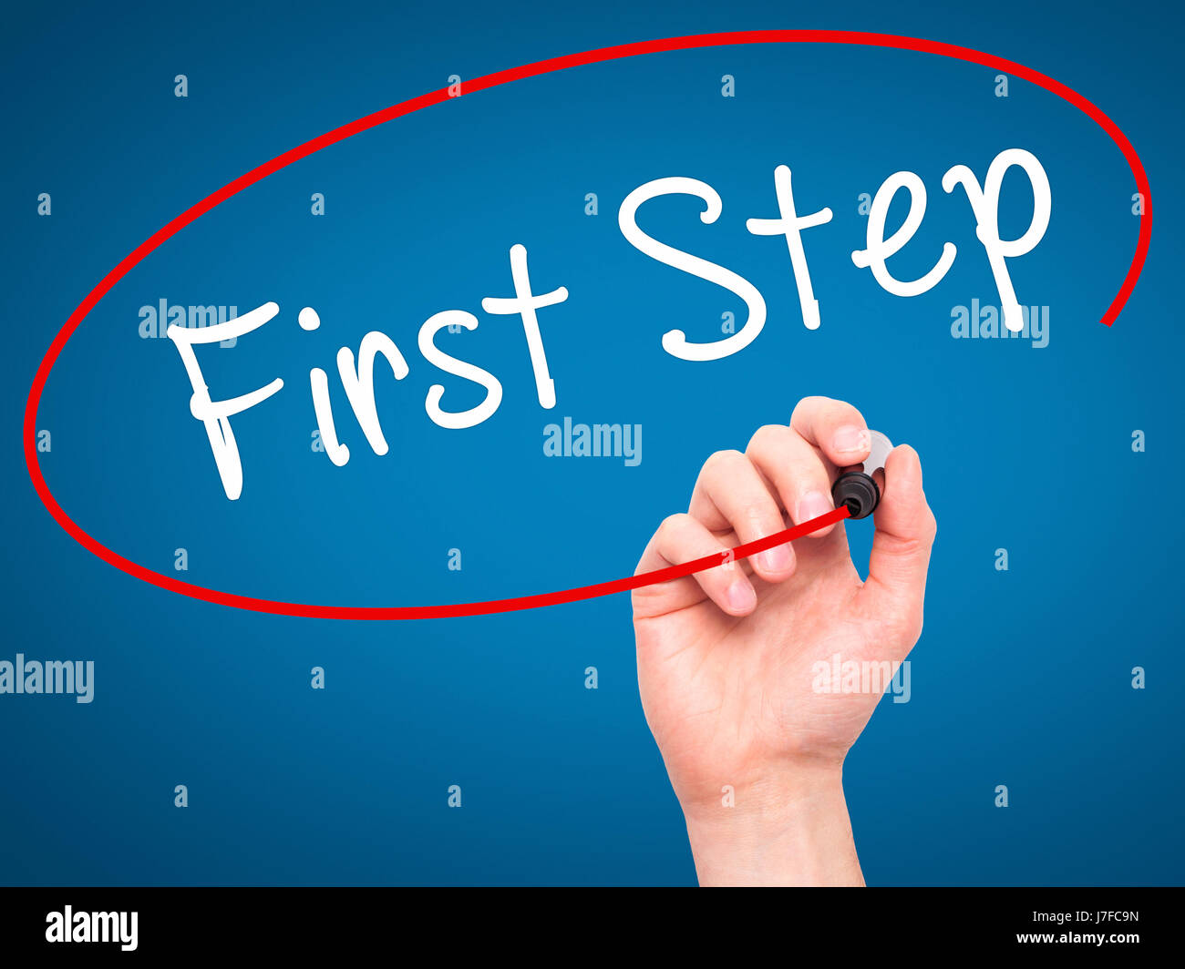 Man Hand writing First Step with black marker on visual screen ...