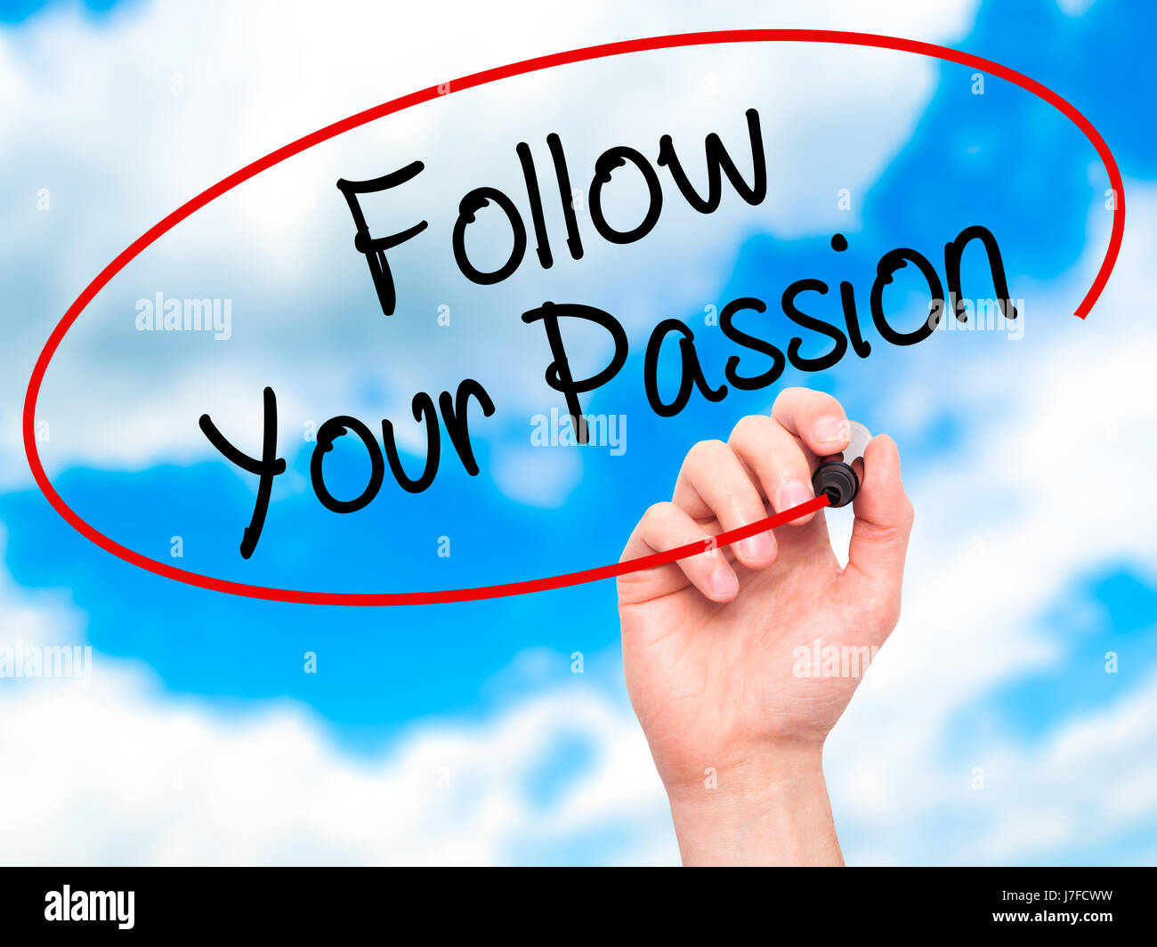 Man Hand writing Follow Your Passion with black marker on visual screen ...