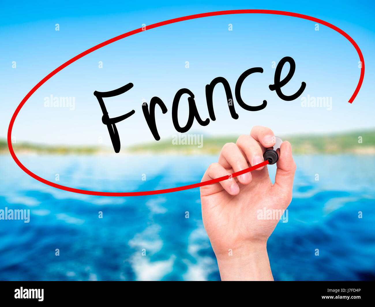 Man Hand writing France with black marker on visual screen. Isolated on ...
