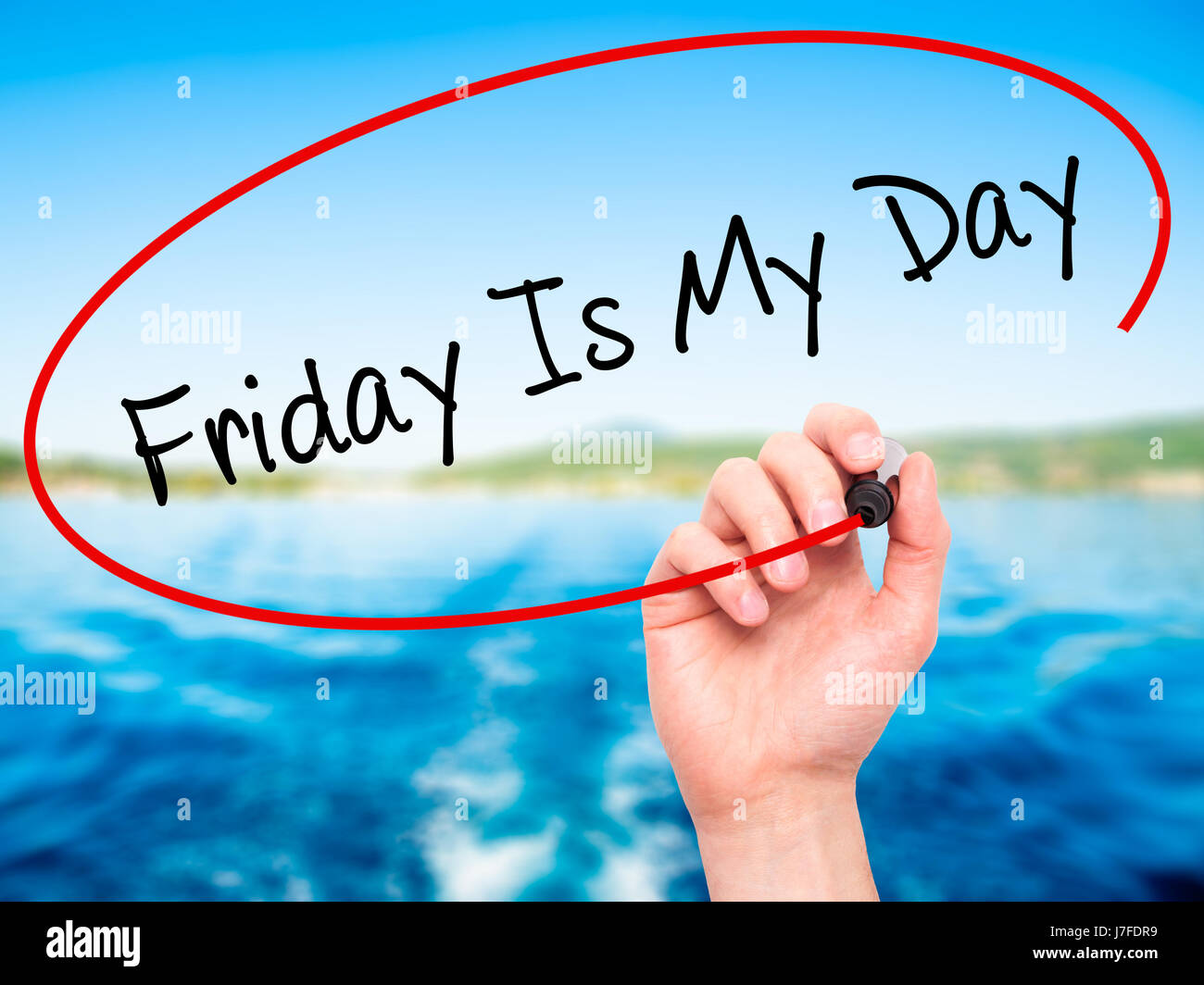 Man Hand writing Friday Is My Day with black marker on visual screen ...