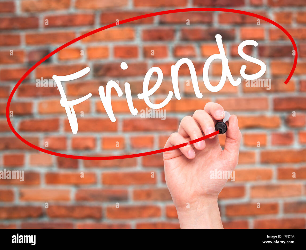 Man Hand writing Friends with black marker on visual screen. Isolated ...