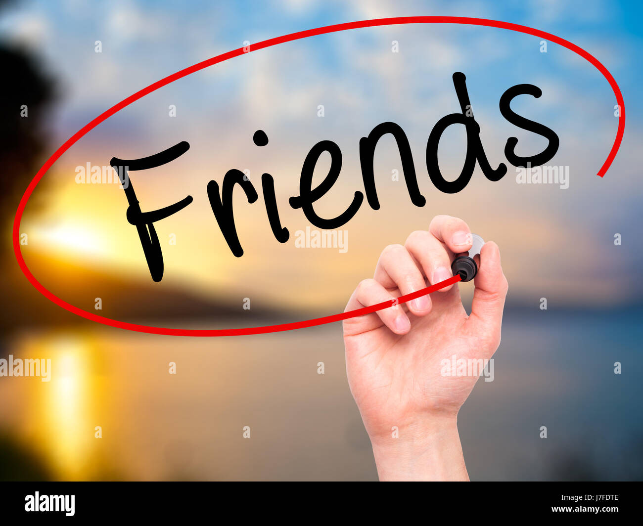 Man Hand writing Friends with black marker on visual screen. Isolated ...