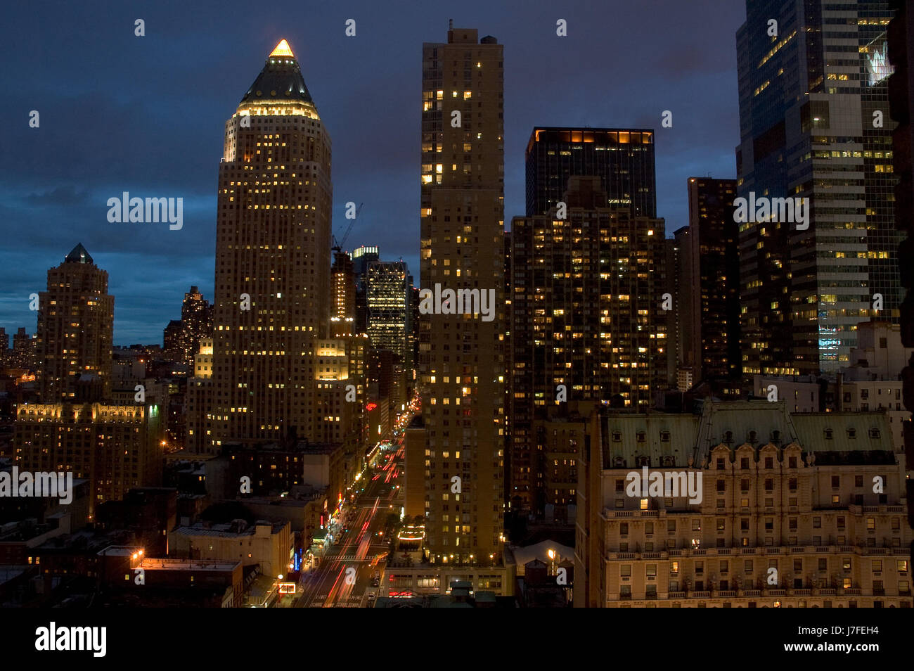 blue tower buildings city town traffic transportation night nighttime ...