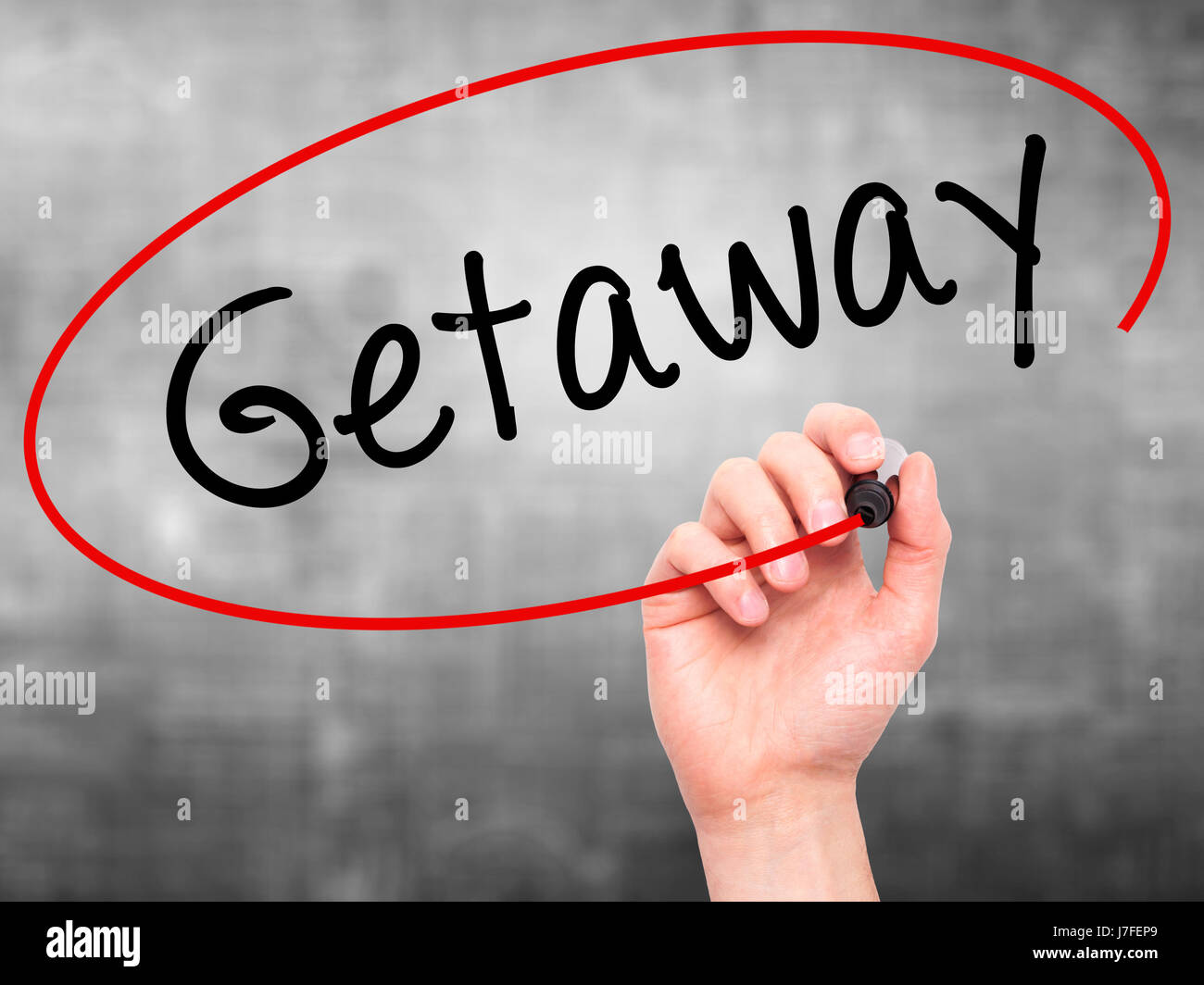 Man Hand writing Getaway with black marker on visual screen. Isolated ...