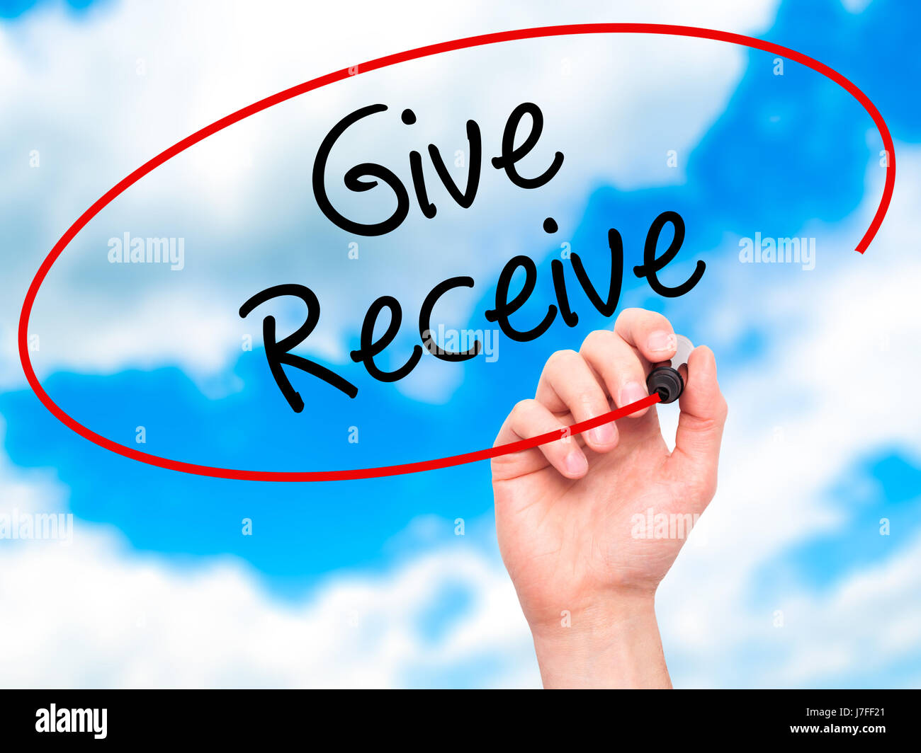 Man Hand writing Give Receive with black marker on visual screen ...