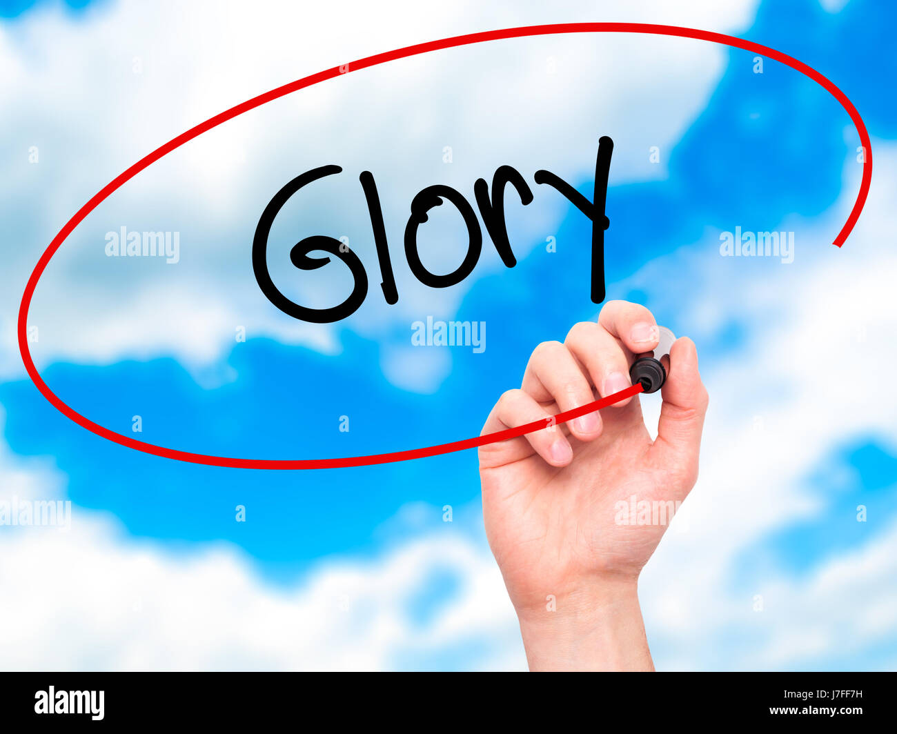 Man Hand writing Glory with black marker on visual screen. Isolated on ...