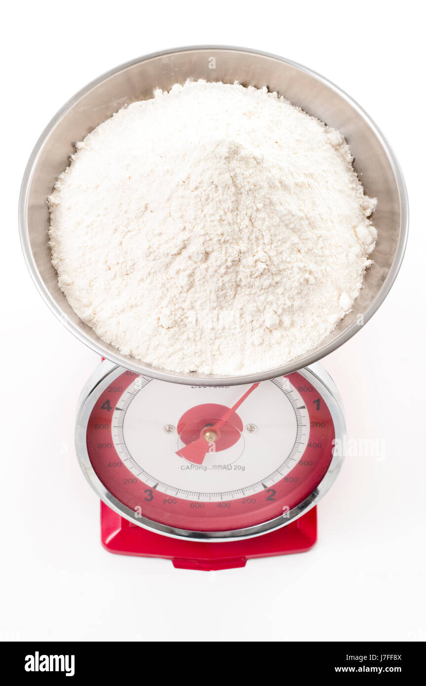 Red weighing scale with flour Cut Out Stock Images & Pictures - Alamy