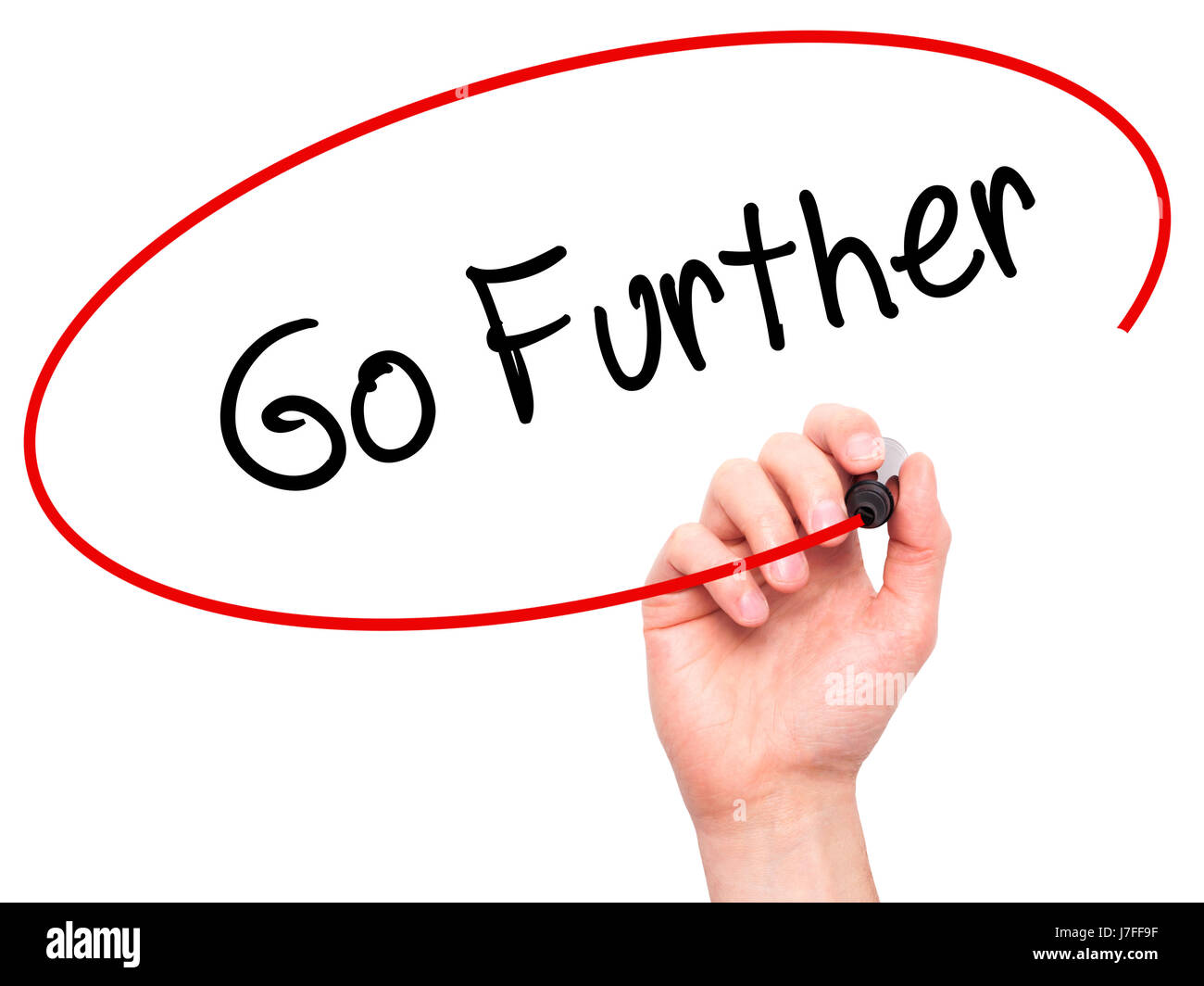 Man Hand writing Go Further with black marker on visual screen ...