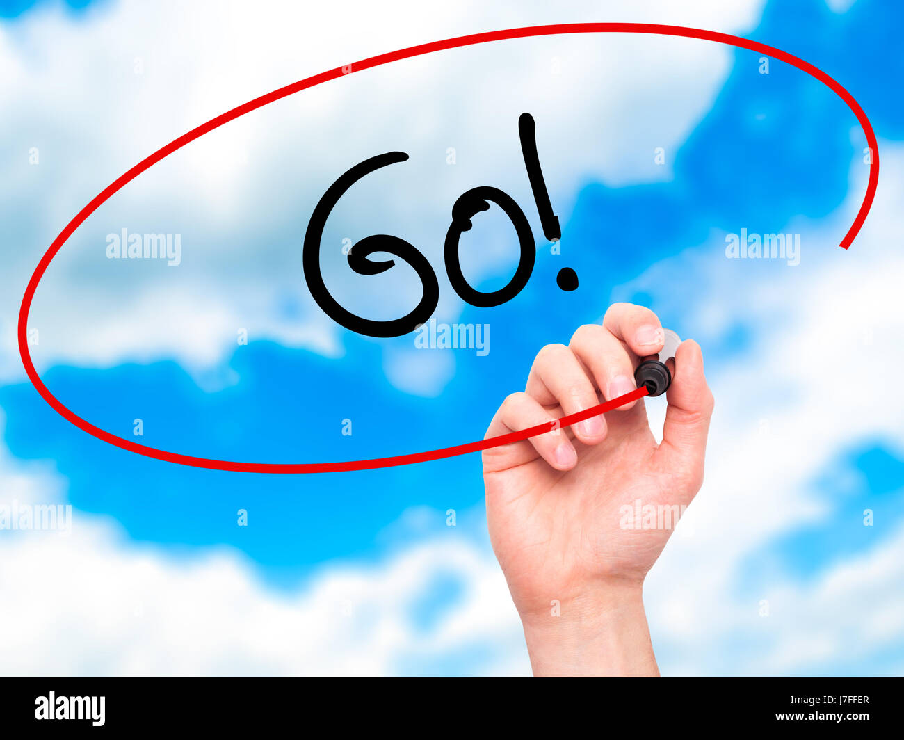 Man Hand writing Go! with black marker on visual screen. Isolated on ...