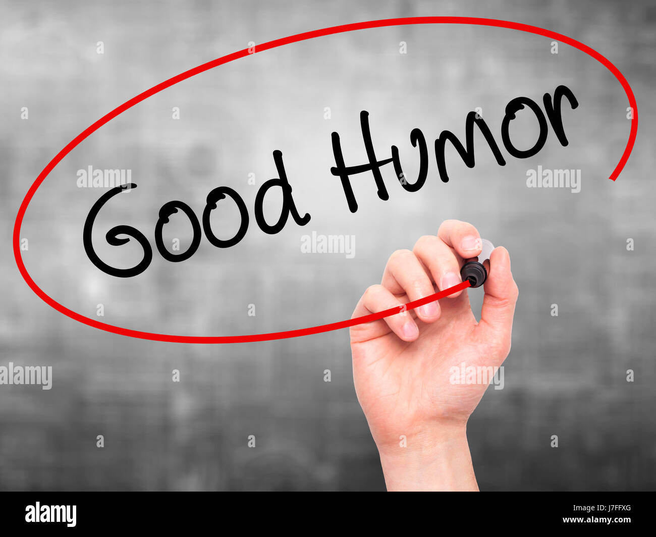 Man Hand writing Good Humor with black marker on visual screen ...