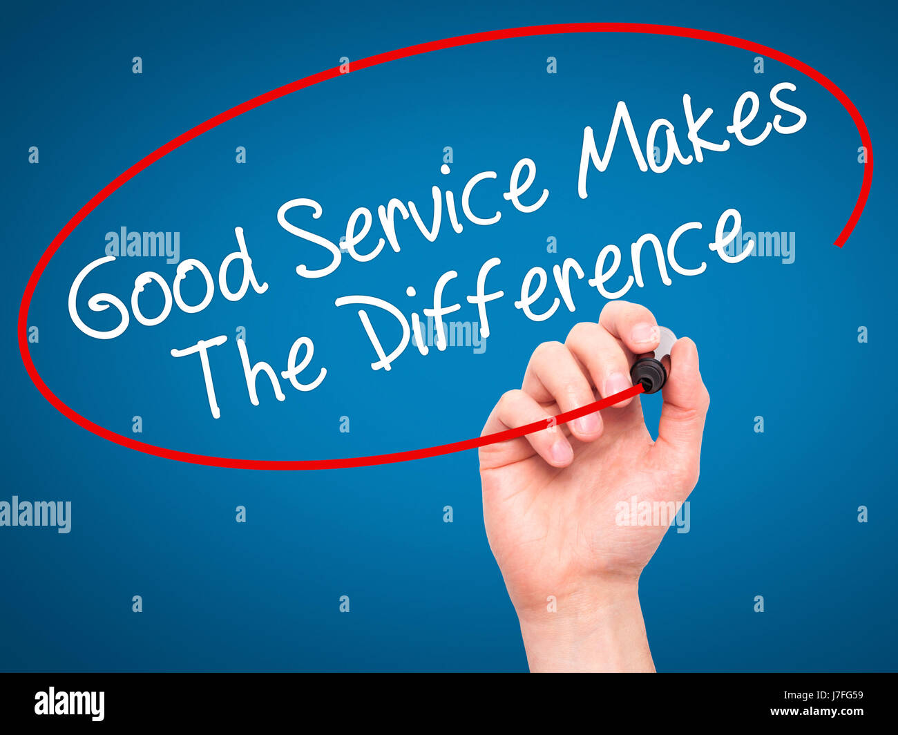 Man Hand writing Good Service Makes The Difference with black marker on ...