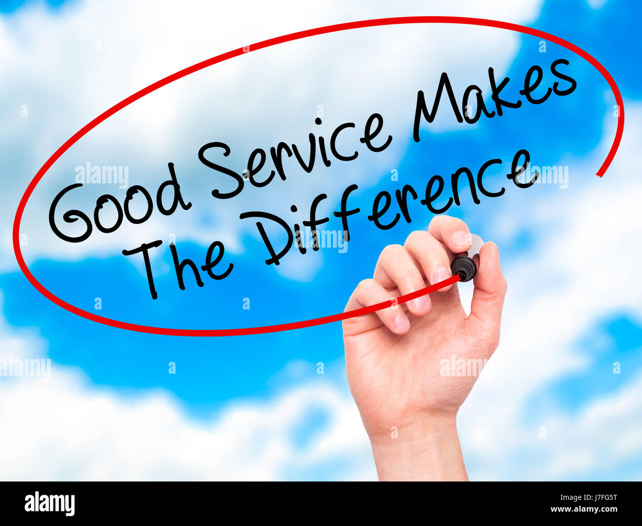 Man Hand writing Good Service Makes The Difference with black marker on ...